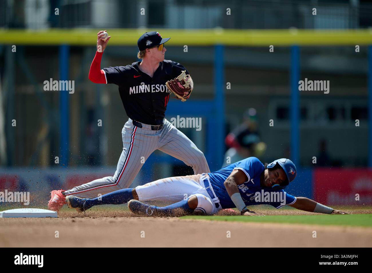 Minnesota Twins shortstop Brandon Winokur (11) attempts to turn a ...