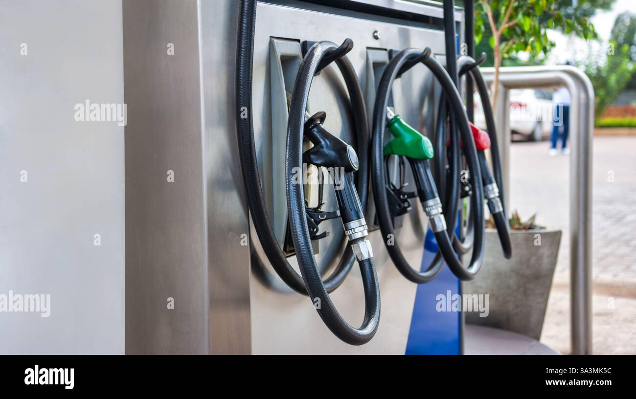 petrol gas pumps at the gas filling station, diesel, unleaded fuel ...