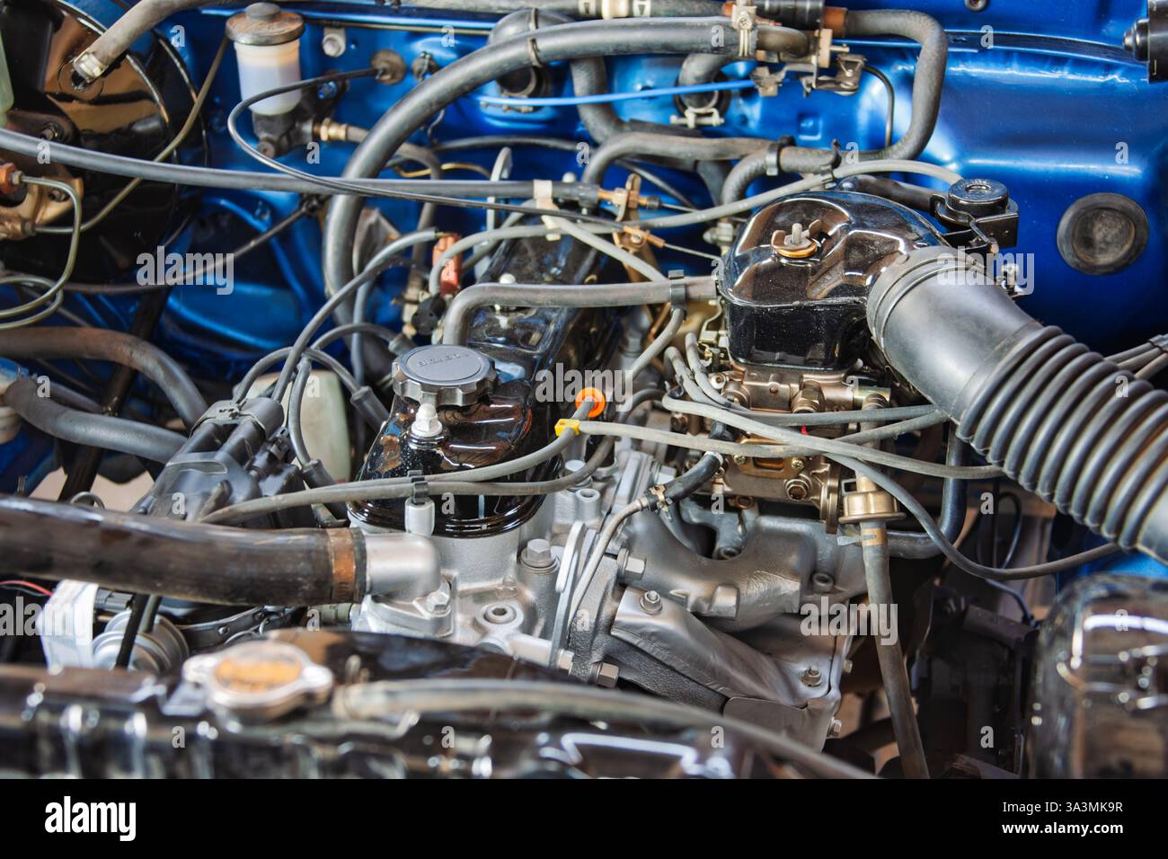 classic car engine with carburetor, open bonnet, rebuild repaired in ...