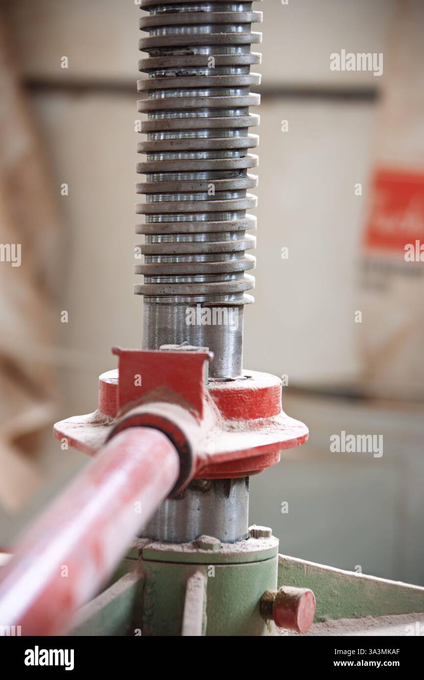 trapezoidal screw threaded rod, nuts and bolts with red handle Stock ...