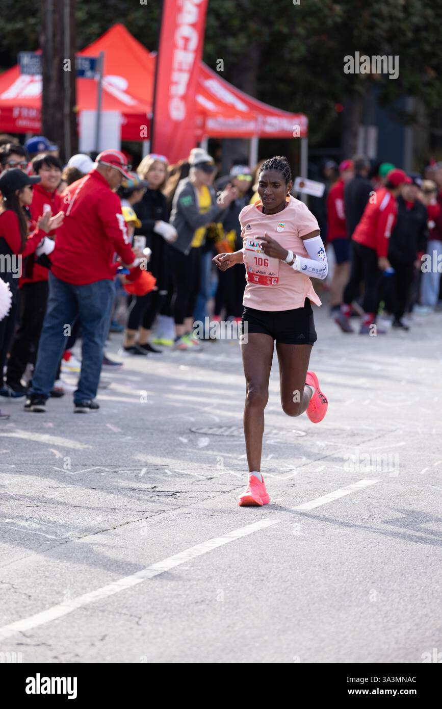 Top runners at the 2025 Los Angeles Marathon, passing mile 20 Stock ...
