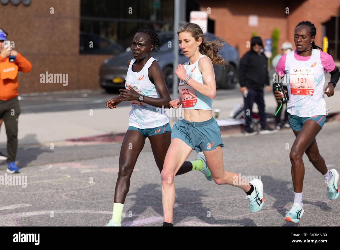Antonia Kwambai, Savannah Berry and Tejinesh Gebisa Tulu pacing closley ...