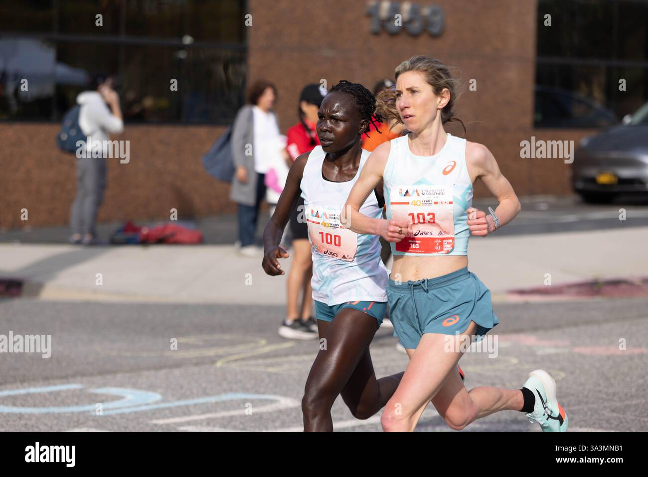 Antonia Kwambai, Savannah Berry and Tejinesh Gebisa Tulu pacing closley ...