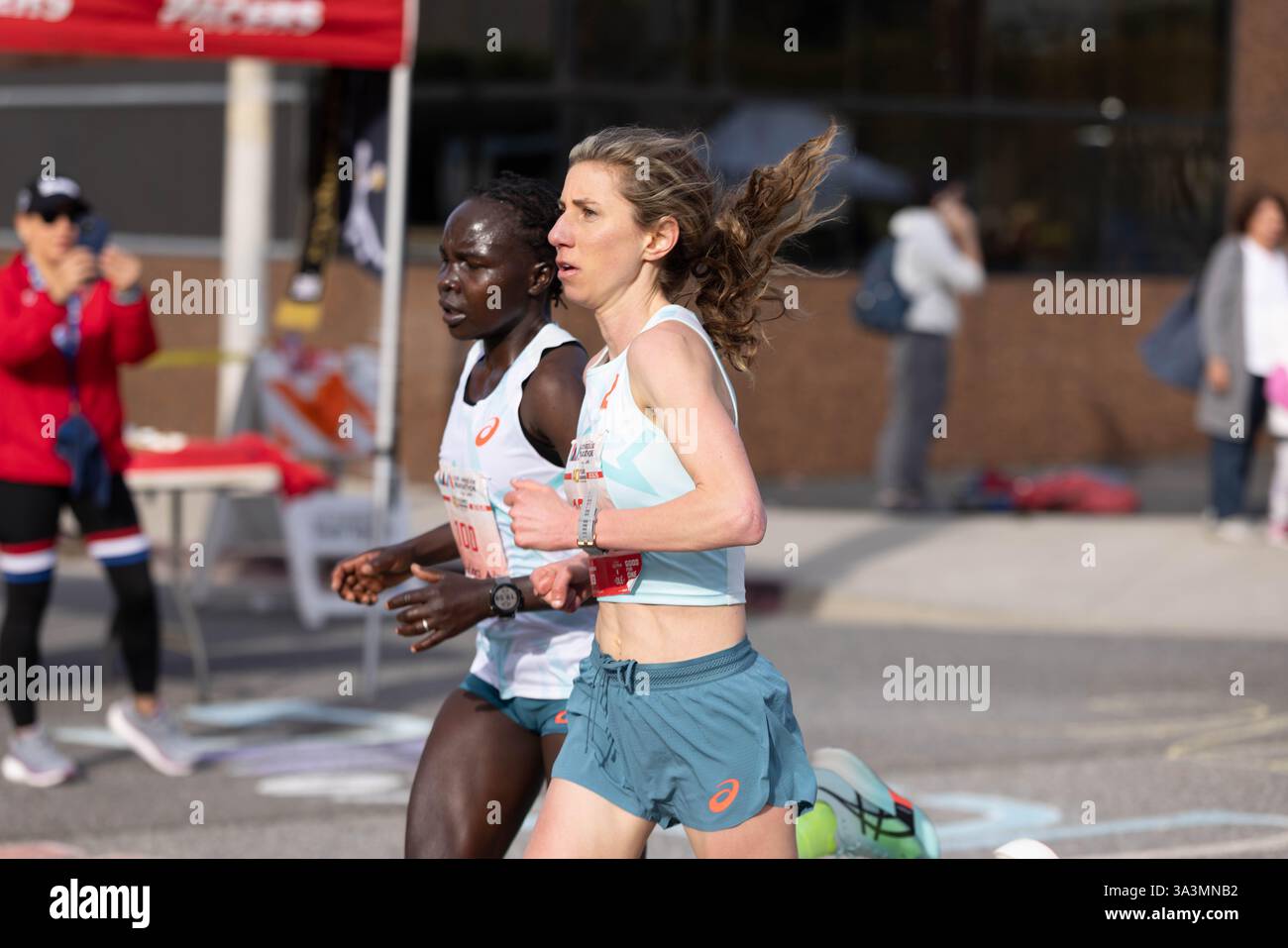 Antonia Kwambai, Savannah Berry and Tejinesh Gebisa Tulu pacing closley ...