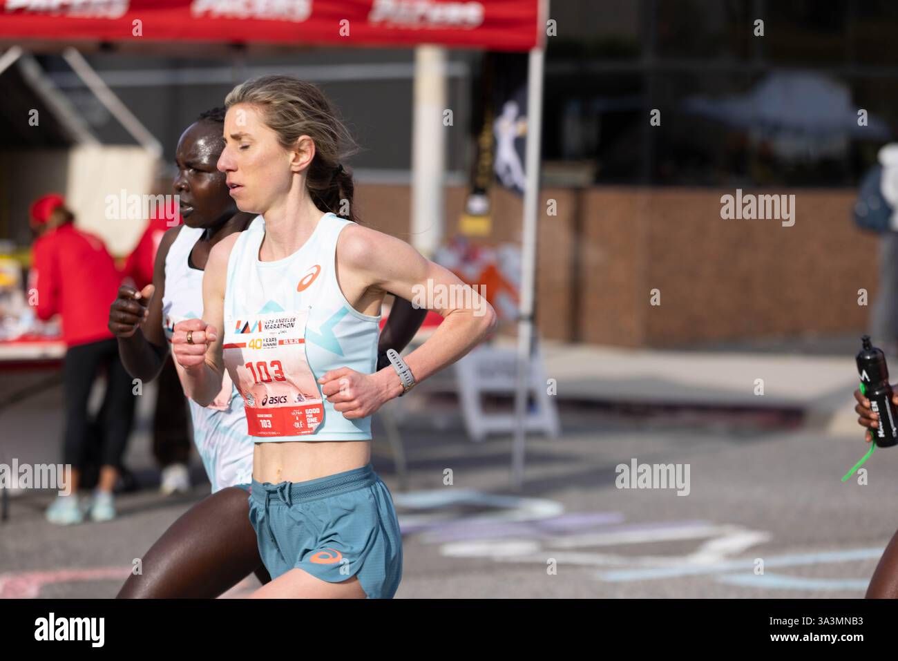 Antonia Kwambai, Savannah Berry and Tejinesh Gebisa Tulu pacing closley ...