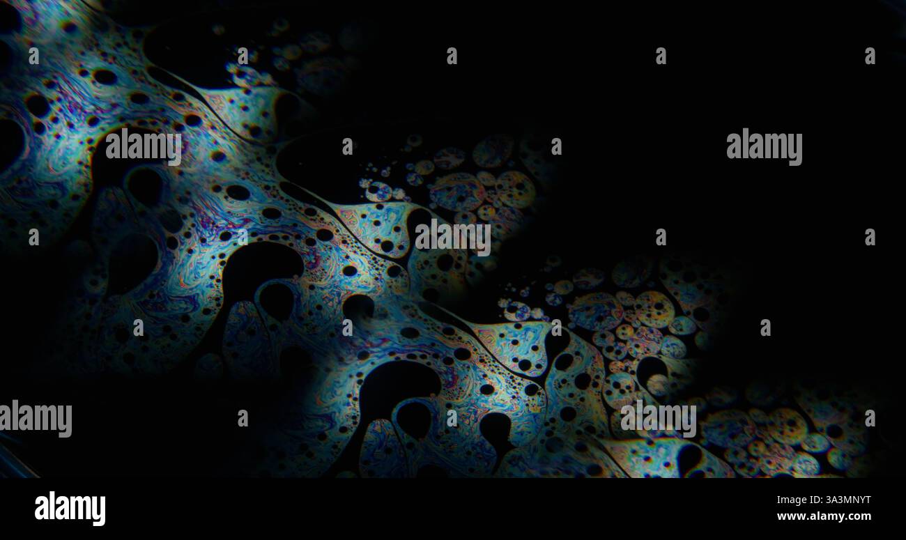 Gasoline fluid. Kaleidoscope lens. Colorful duplicated light spot on ...