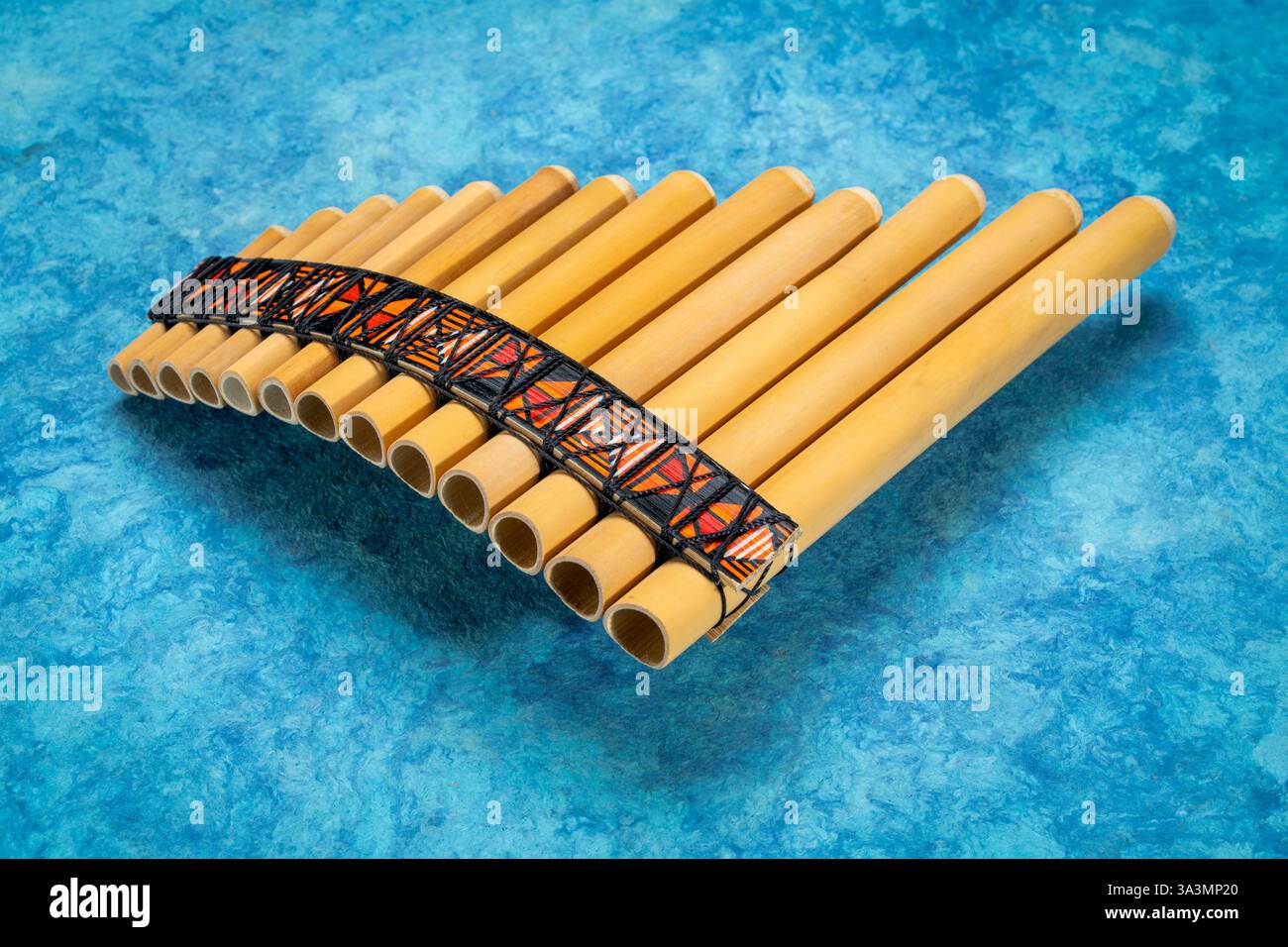 bamboo pan flute instrument from Peru against textured art paper Stock ...