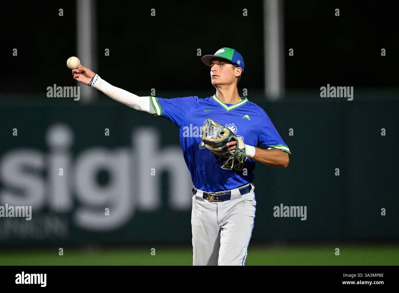 Florida Gulf Coast infielder Tyler Herb (23) throws during an NCAA ...