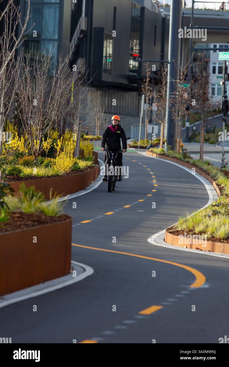 Seattle, Washington, USA. 16th March 2025. A cyclist rides the newly ...