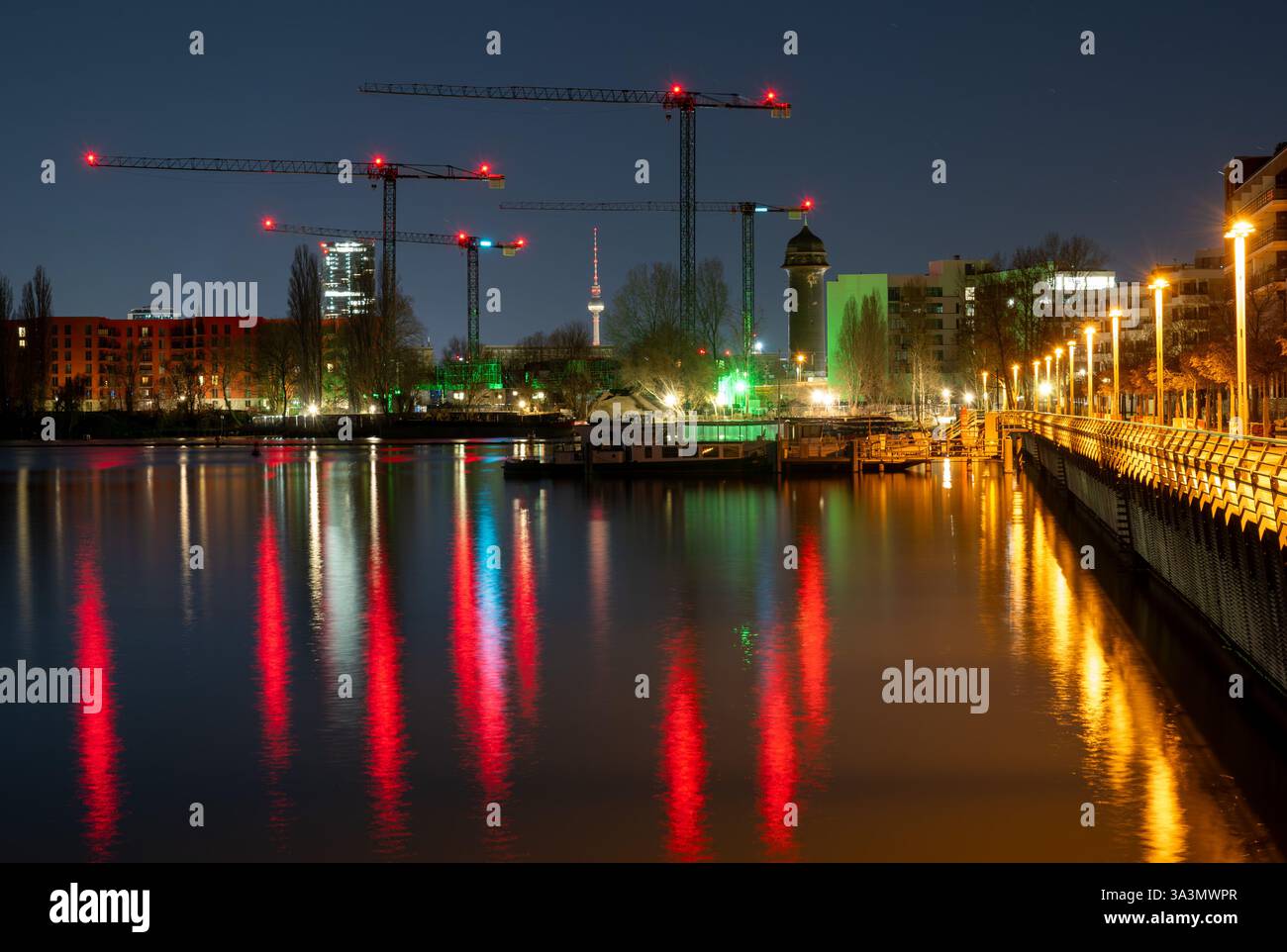Berlin, Germany. 17th Mar, 2025. The cranes of a construction site near ...