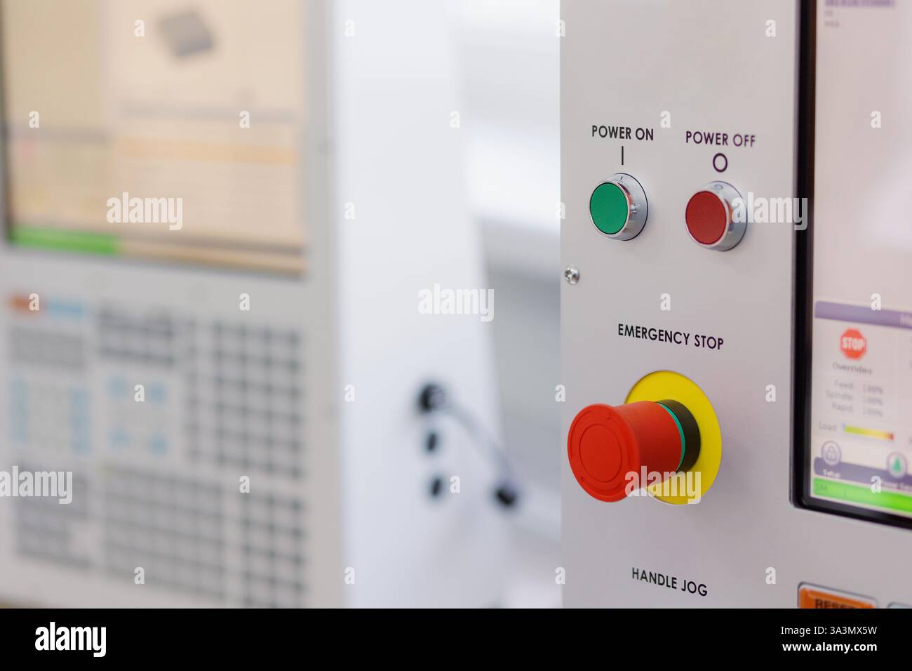 A close-up view of a CNC machine control panel highlighting essential ...