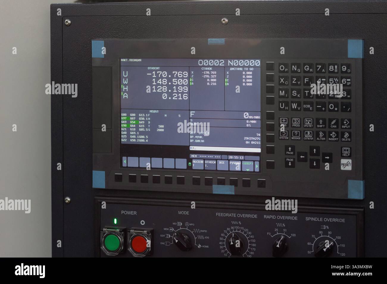 In a busy manufacturing plant, a detailed control panel showcases essential operational data ...