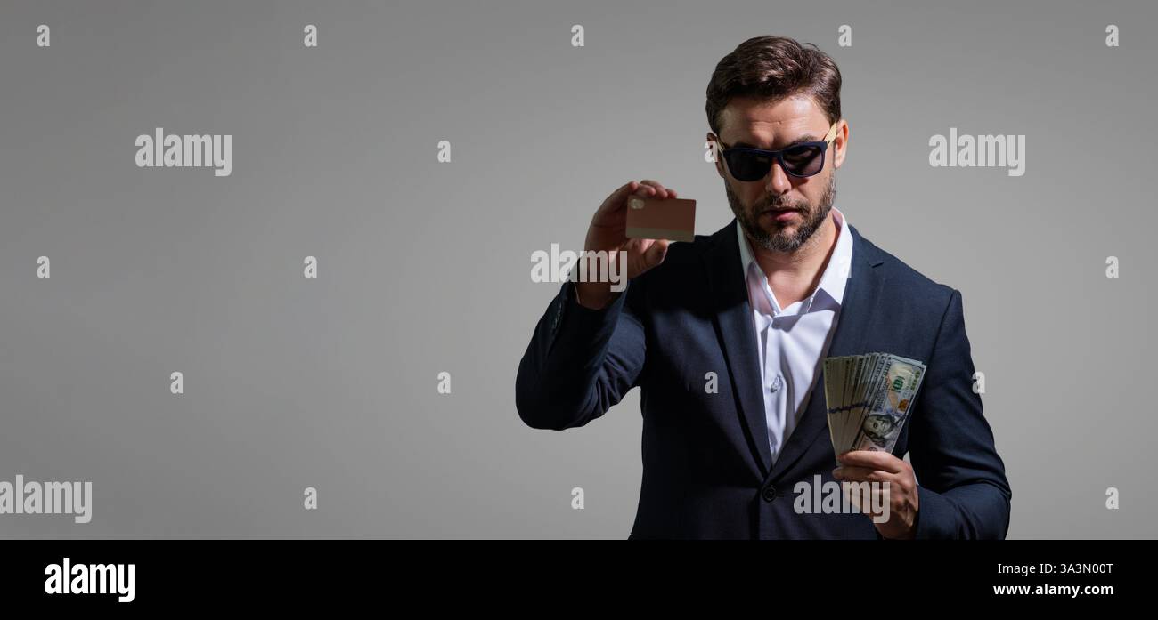 Successful business man counting money. Handsome middle age man holding ...