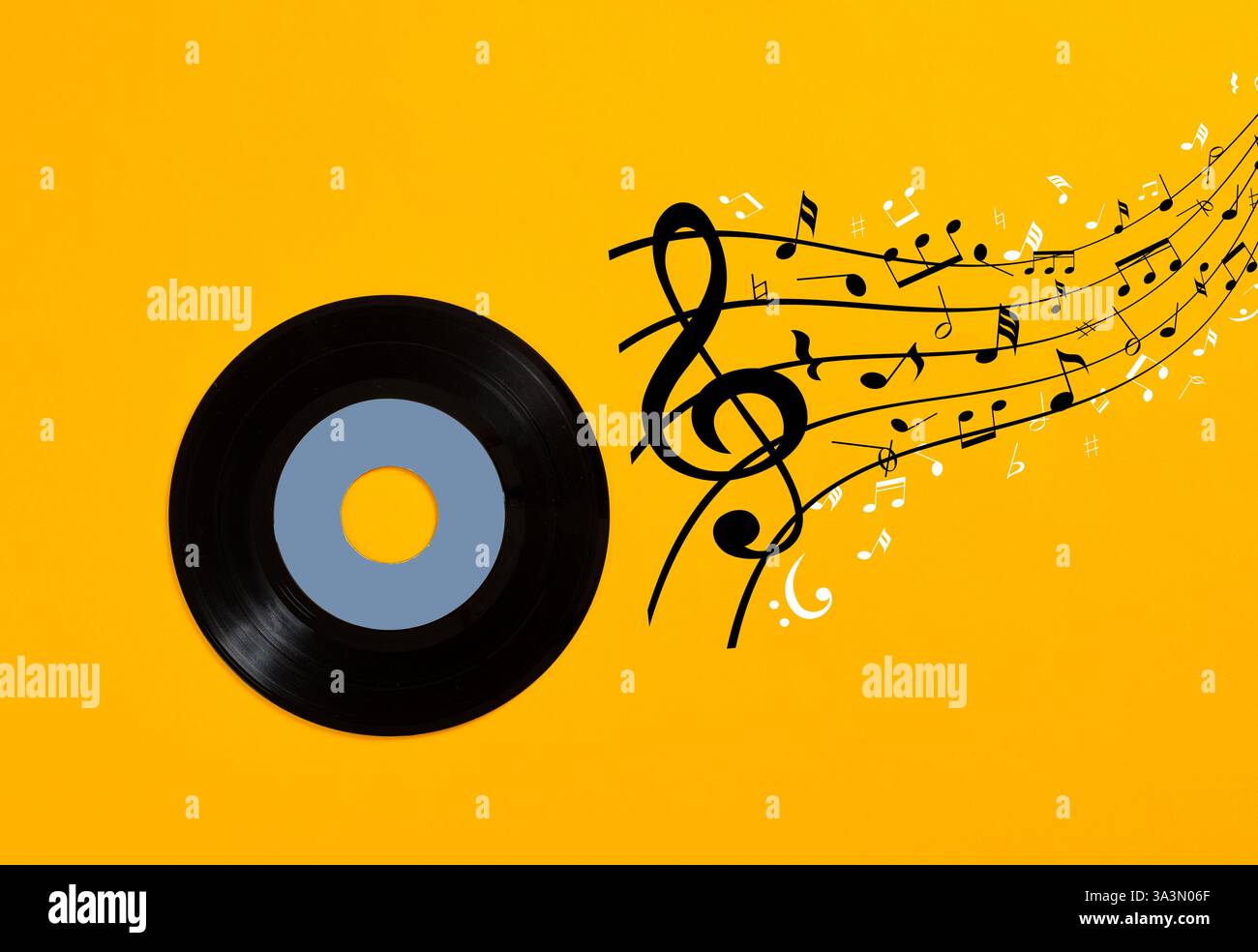 Black vinyl record playing a stream of music notes on a yellow ...