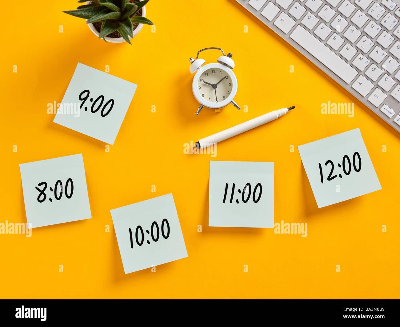 Sticky notes showing a work schedule from 8 to 12, alarm clock, pen and ...