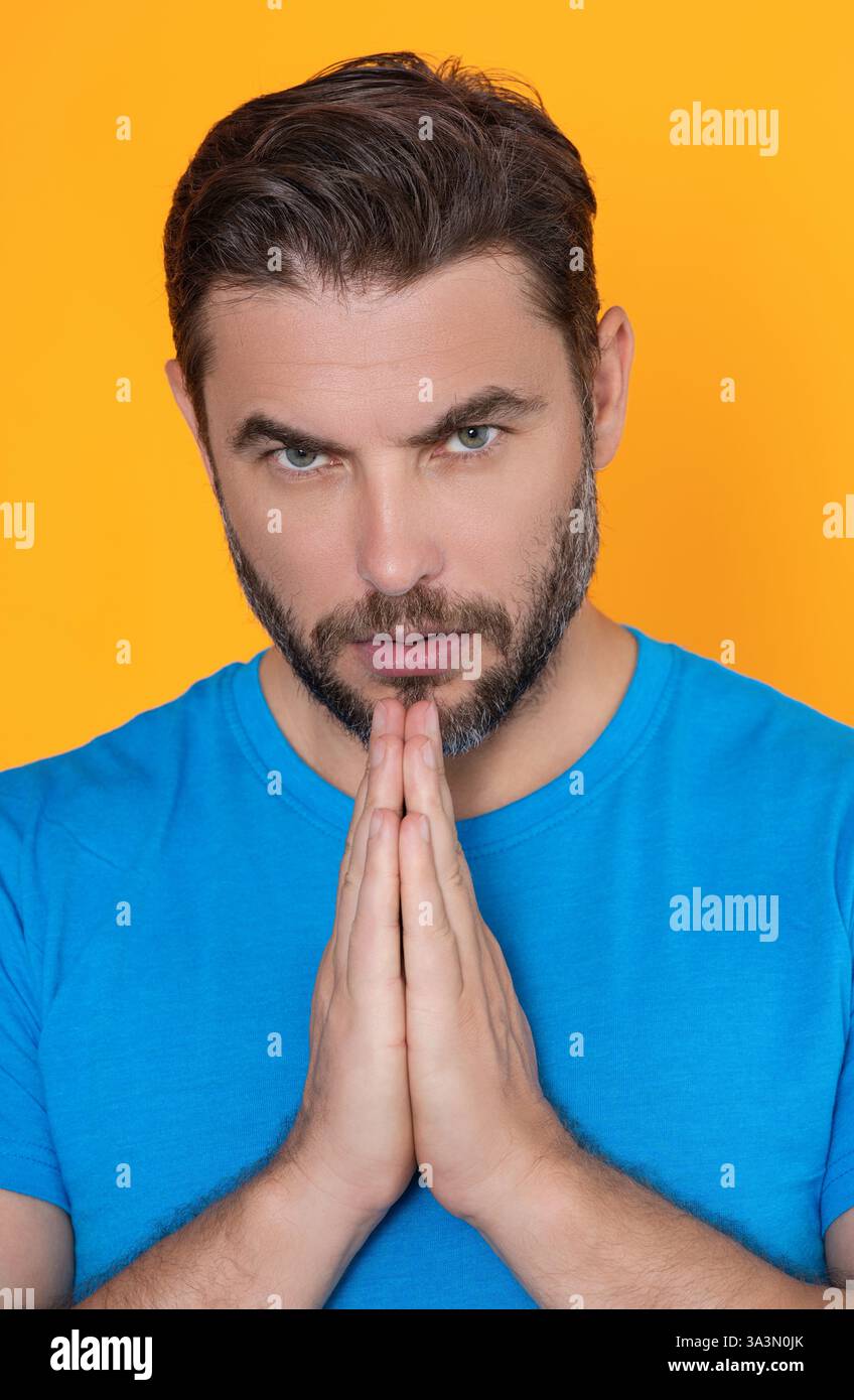 Man praying. Isolated portrait of male pray. Man kneeling and praying ...