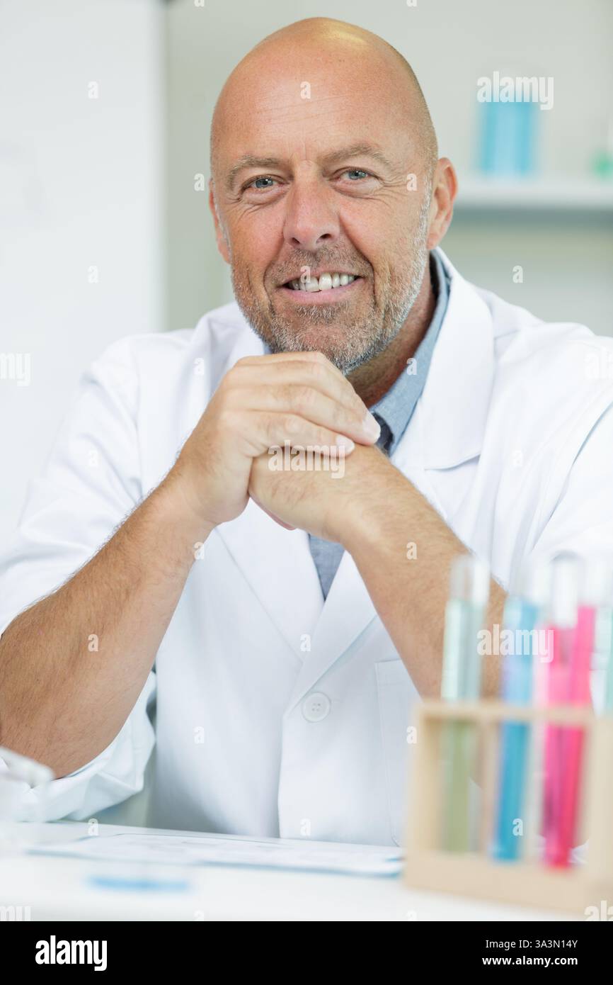 Cheerful handsome male scientists hi-res stock photography and images ...