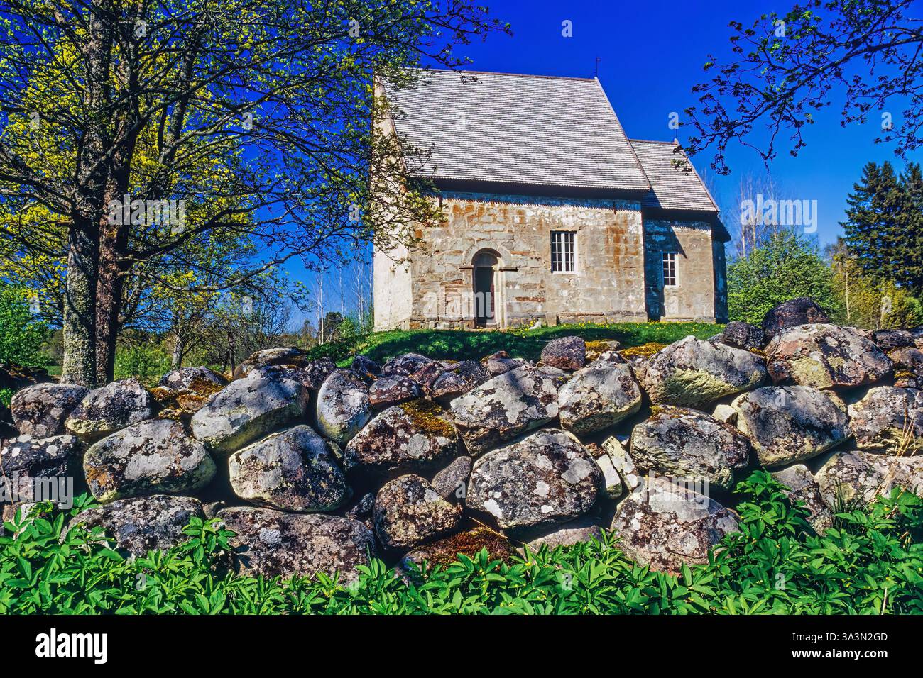 Idyllic old stone church from the Middle Ages in the countryside Stock ...
