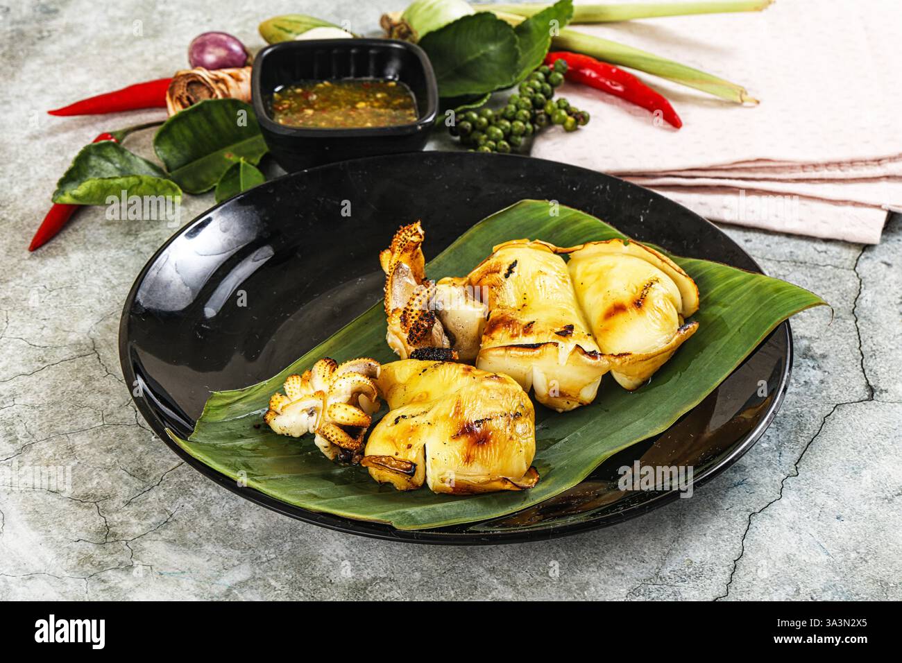 Delicous Grilled cuttlefish with sauce asian style Stock Photo - Alamy