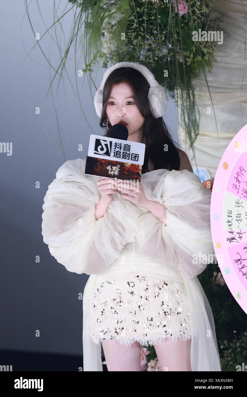 Chinese actress and singer Yu Shuxin attends an activity in Beijing ...