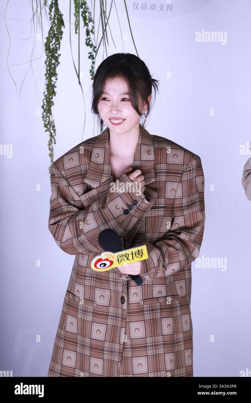 Chinese actress and singer Yu Shuxin attends an activity in Beijing ...
