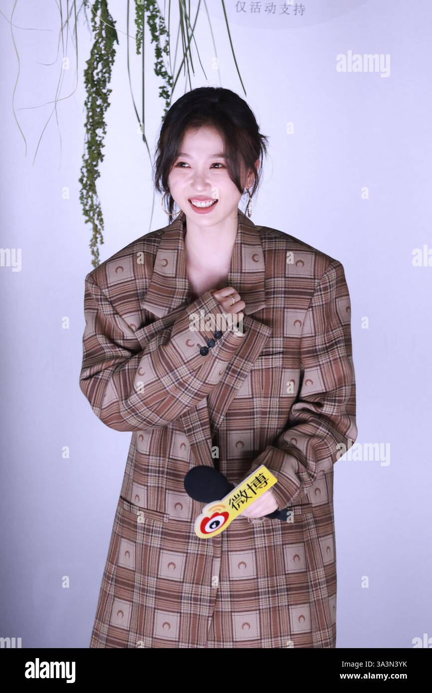 Chinese actress and singer Yu Shuxin attends an activity in Beijing ...