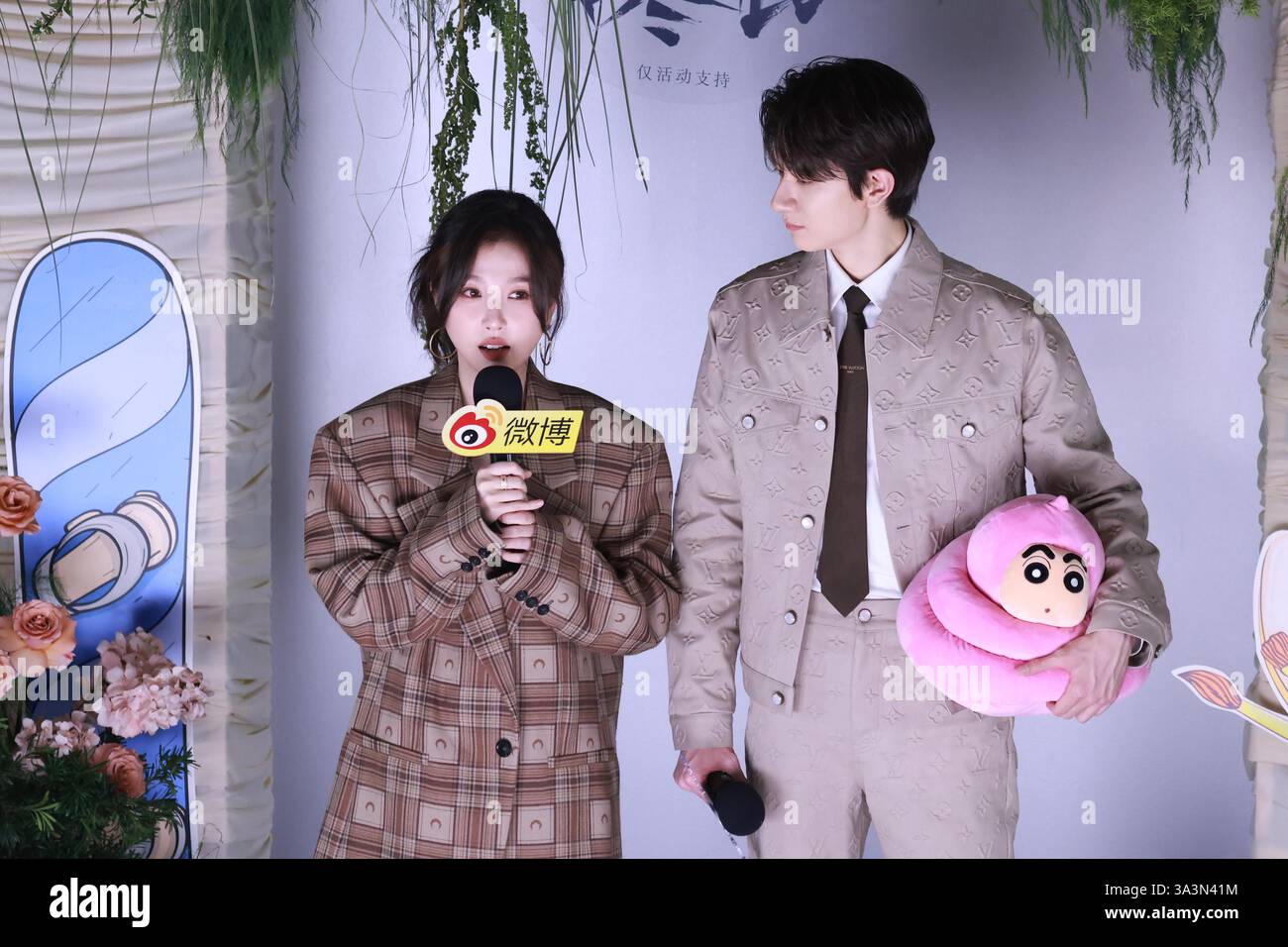 Chinese actress and singer Yu Shuxin attends an activity in Beijing ...