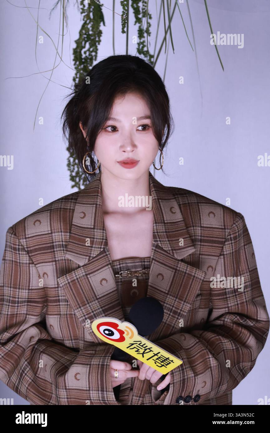 Chinese actress and singer Yu Shuxin attends an activity in Beijing ...