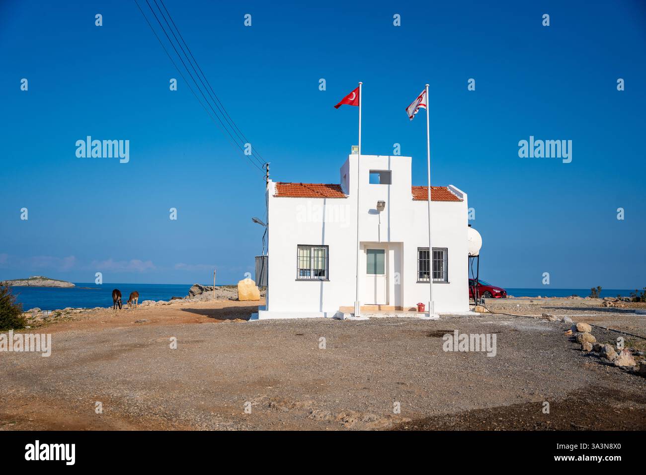 Small white building at the northeasternmost cape of Cyprus with the ...