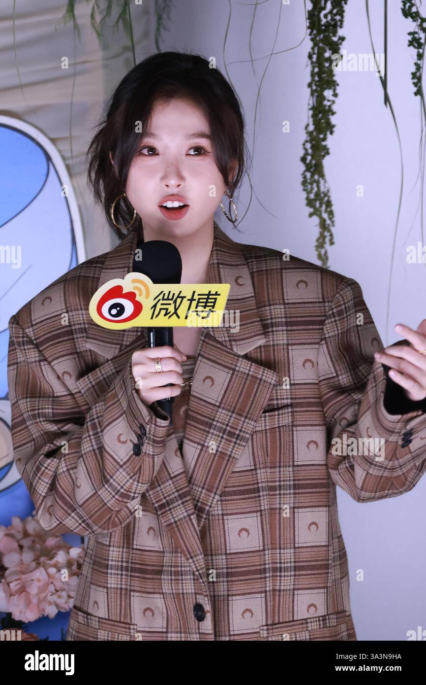 Chinese actress and singer Yu Shuxin attends an activity in Beijing ...