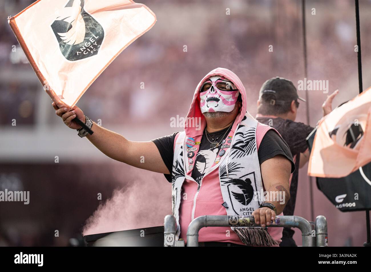 Angel City FC fan celebrates during a NWSL match between the Angel City ...