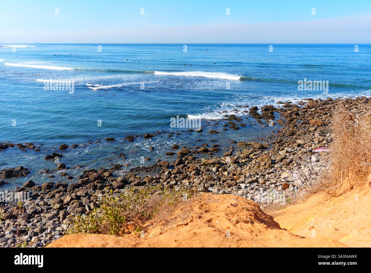 Vibrant view of multiple surfers catching waves off the coast of Lunada ...