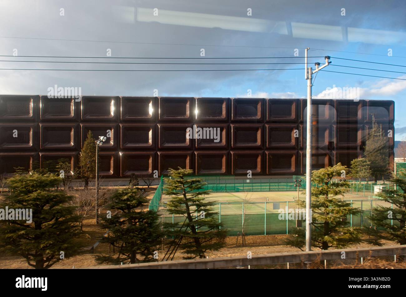 Giant chocolate bar seen from JR train line in Takatsuki near Osaka ...