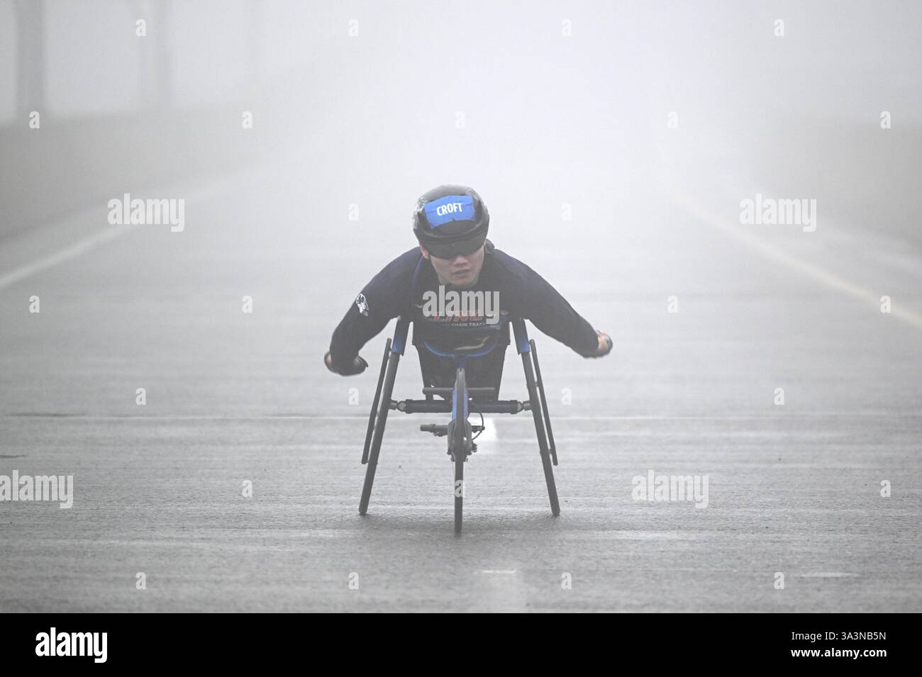 Through dense early morning fog, Phillip Croft in the Mens Wheelchair ...