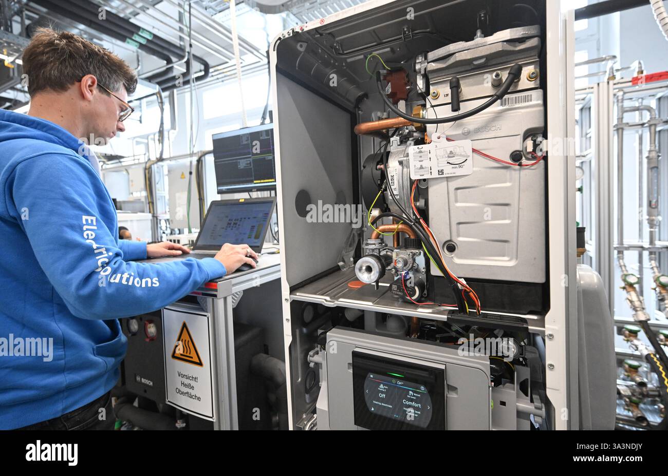 Wernau, Germany. 13th Mar, 2025. A test engineer from the Bosch Home ...