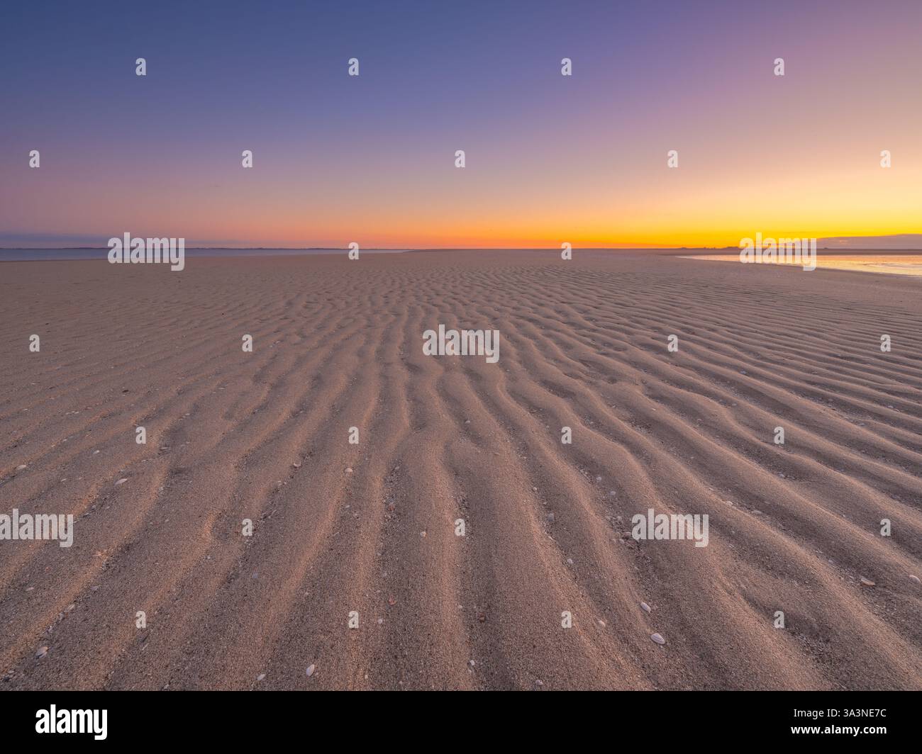 An endless seascape image with beautiful colors in the sky and ...