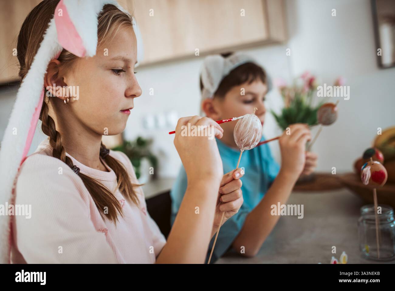 Girl bunny ears decorating hi-res stock photography and images - Alamy