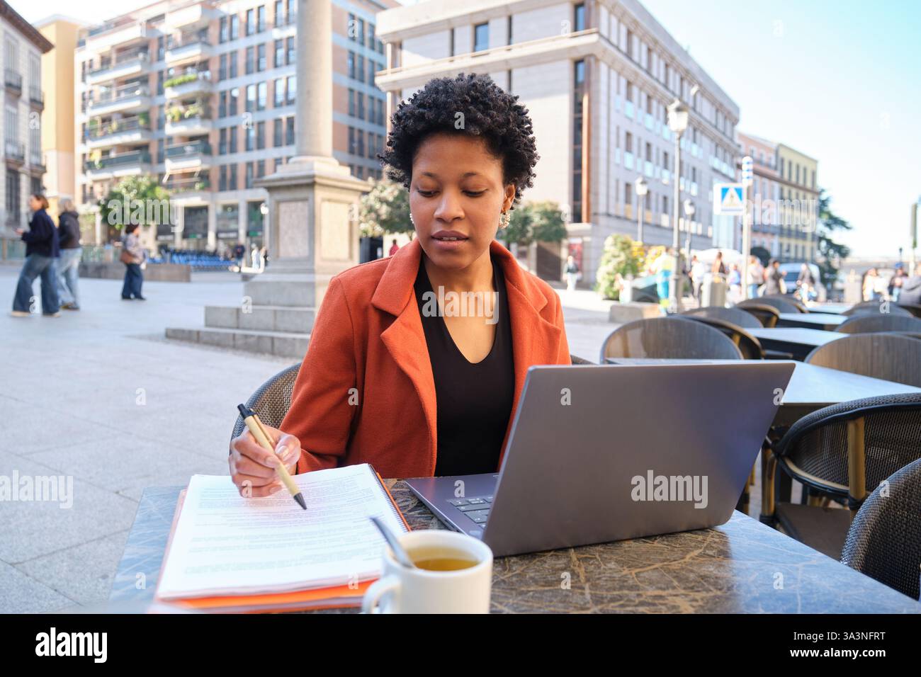 Professional Woman Working Outdoors in Urban Setting Stock Photo - Alamy