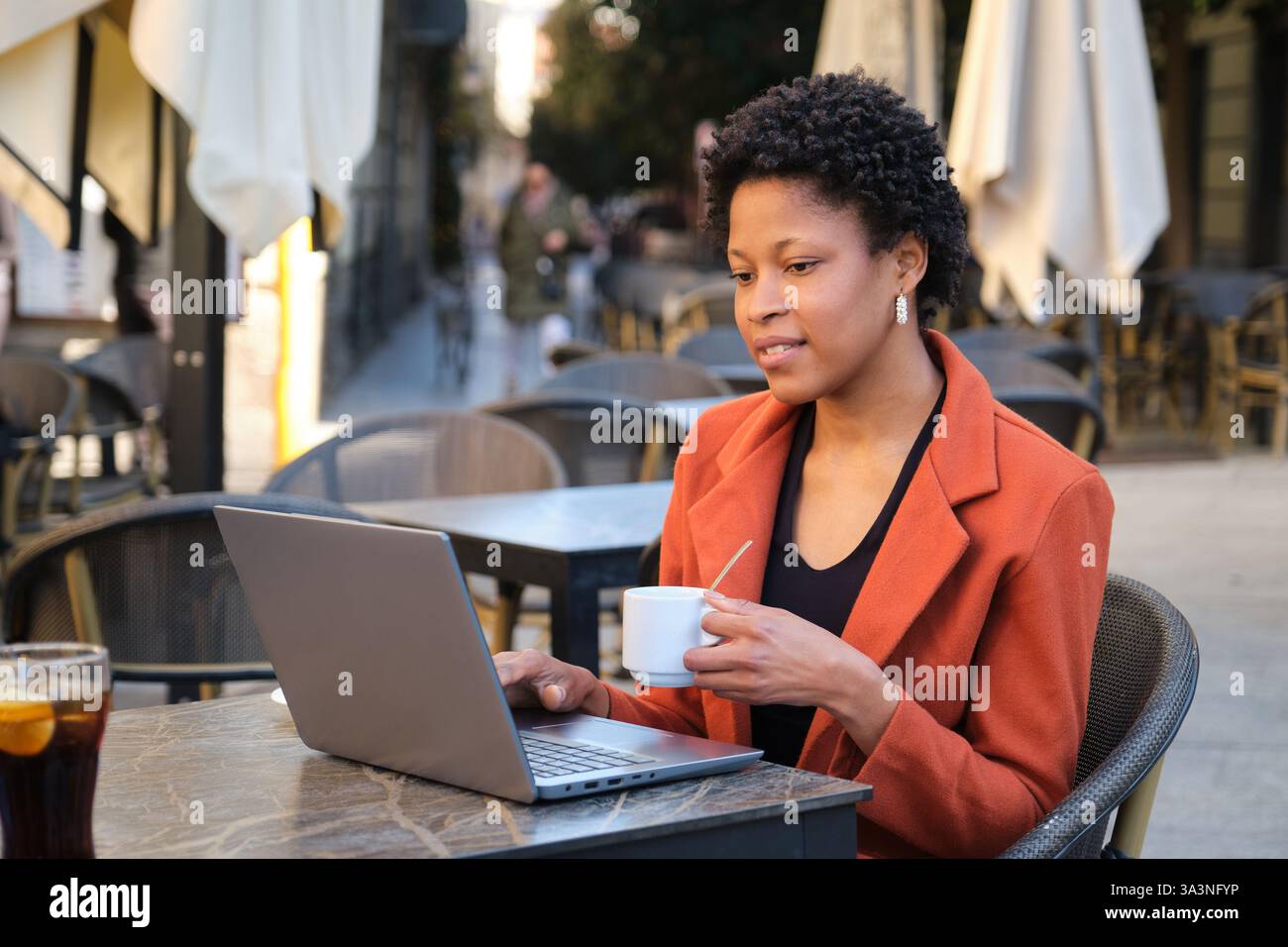 Woman laptop cafe remote hi-res stock photography and images - Alamy