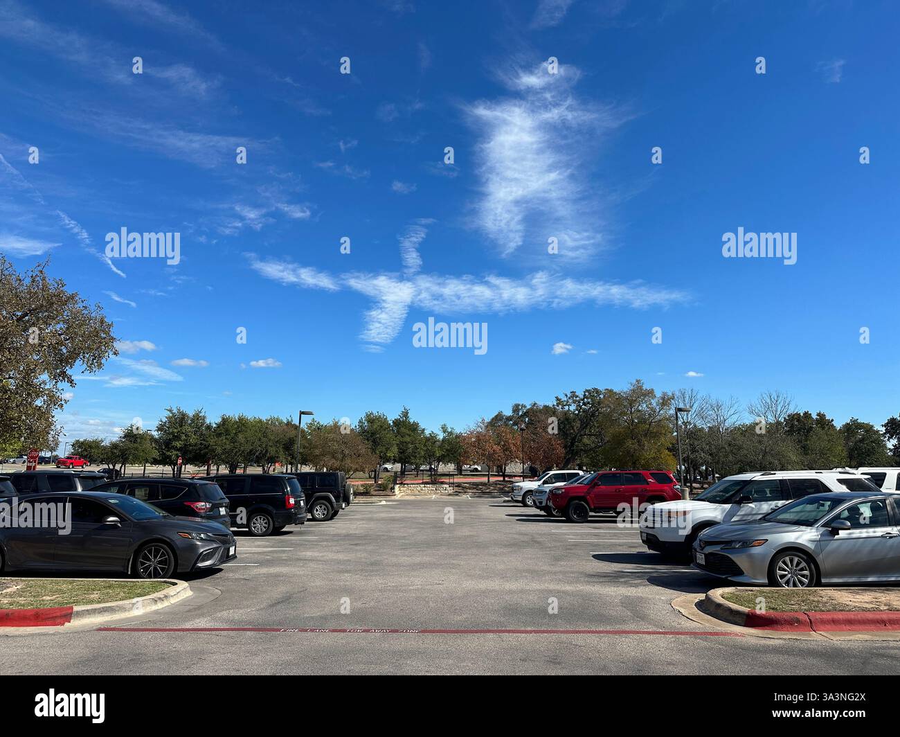 Person rising from the cross in the clouds, Beecaves, Texas Stock Photo ...