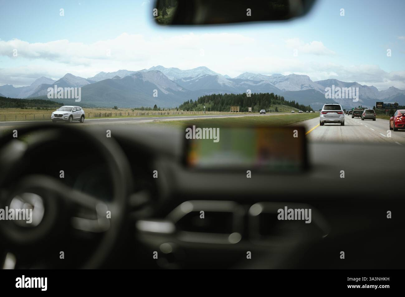 Car interior with GPS navigation while driving toward Banff Stock Photo ...