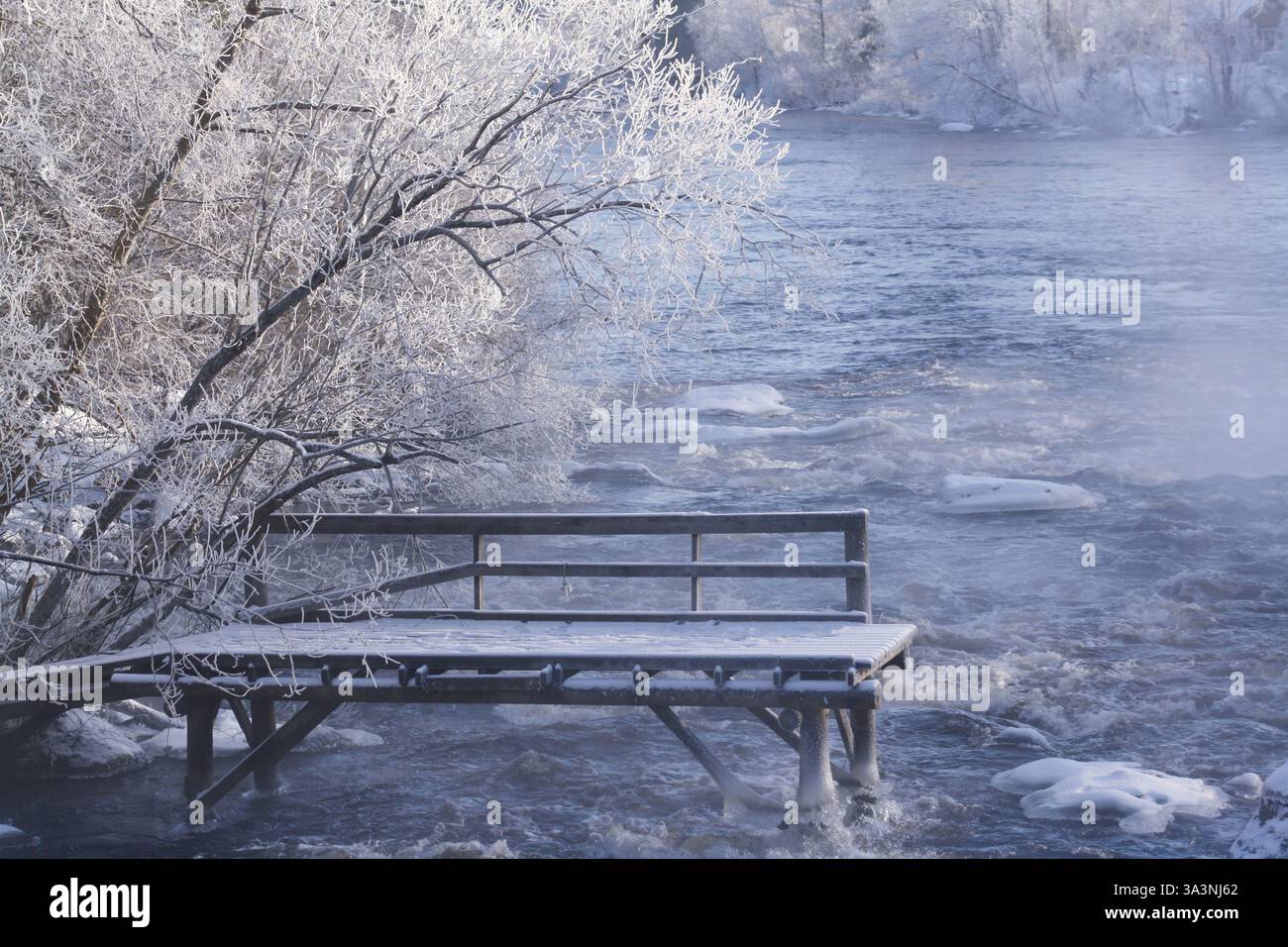 frozen pier in winter rapids landscape snow and ice Stock Photo - Alamy