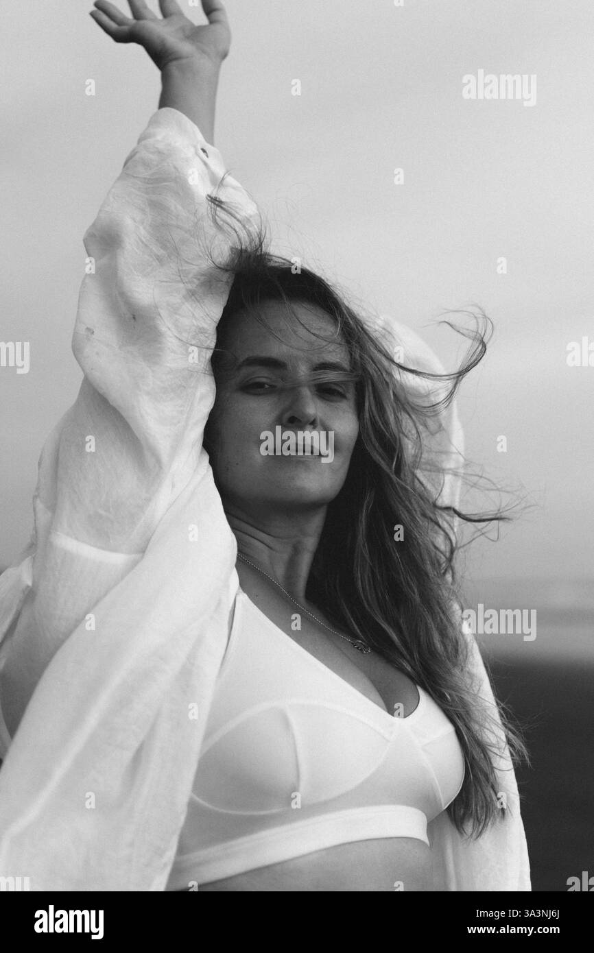 Sunset on remote beach Black and White Stock Photos & Images - Alamy