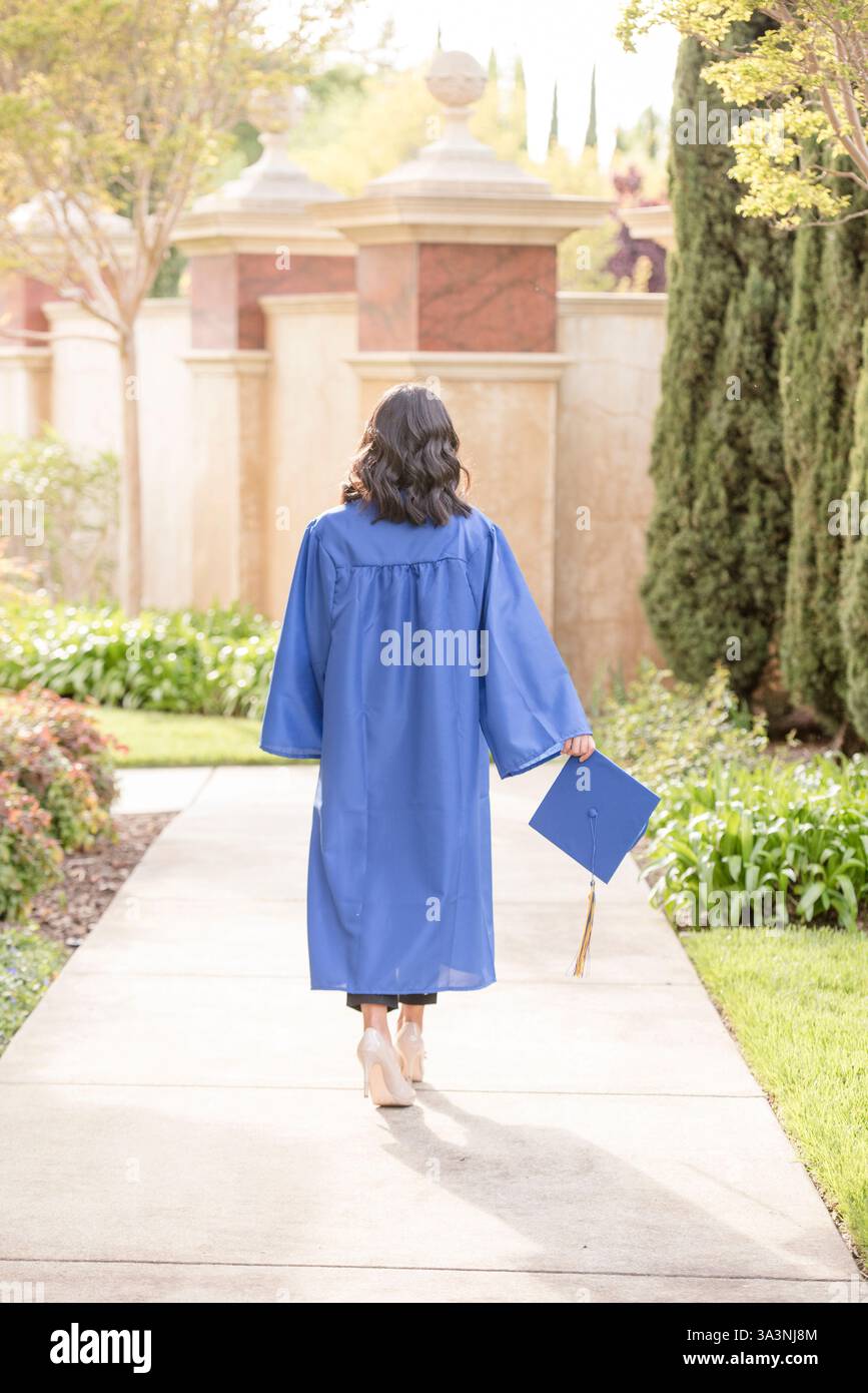 Proud graduate embracing her bright future ahead Stock Photo - Alamy