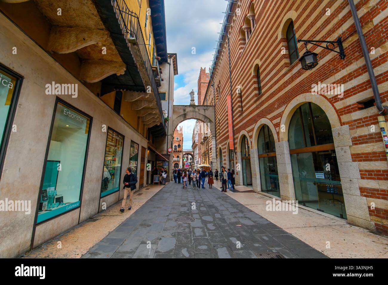 Verona, Italy. Pedestrian streets of colorful buildings with luxury and ...
