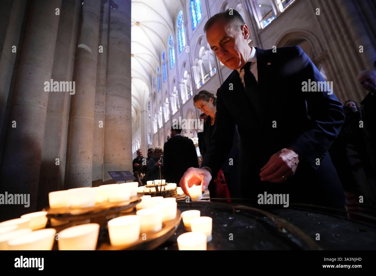 Prime Minister Mark Carney and wife Diana Fox Carney light candles ...