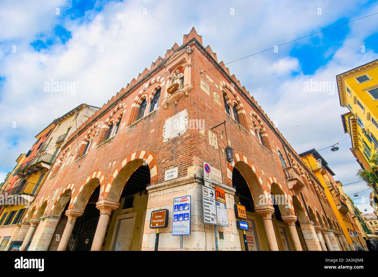 Verona, Italy. Traditional colorful building with balconies, shutter ...