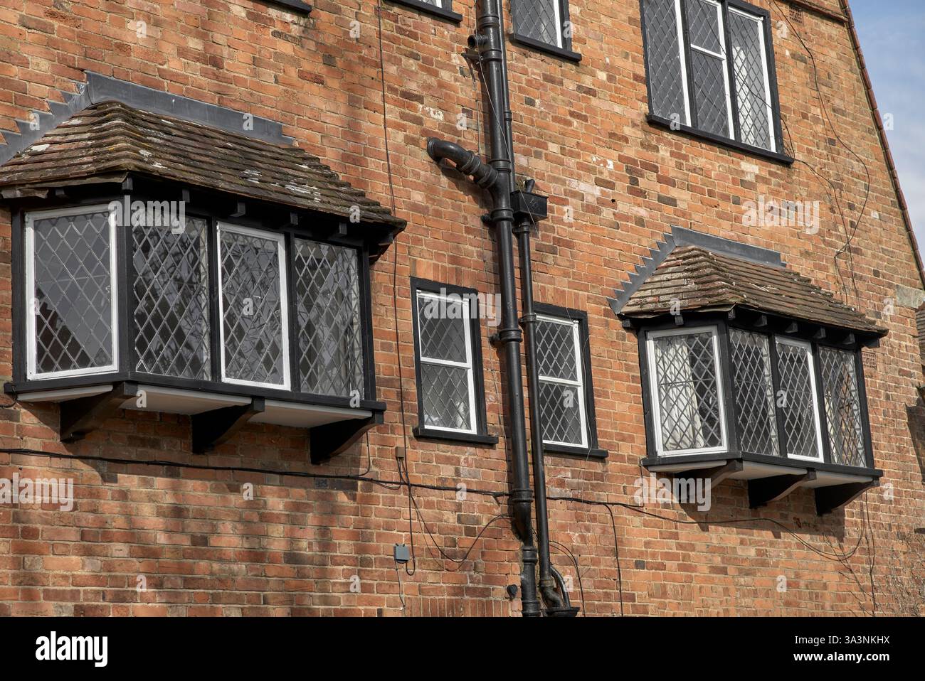 Leaded light Bay Windows. House exterior, England, UK Stock Photo - Alamy