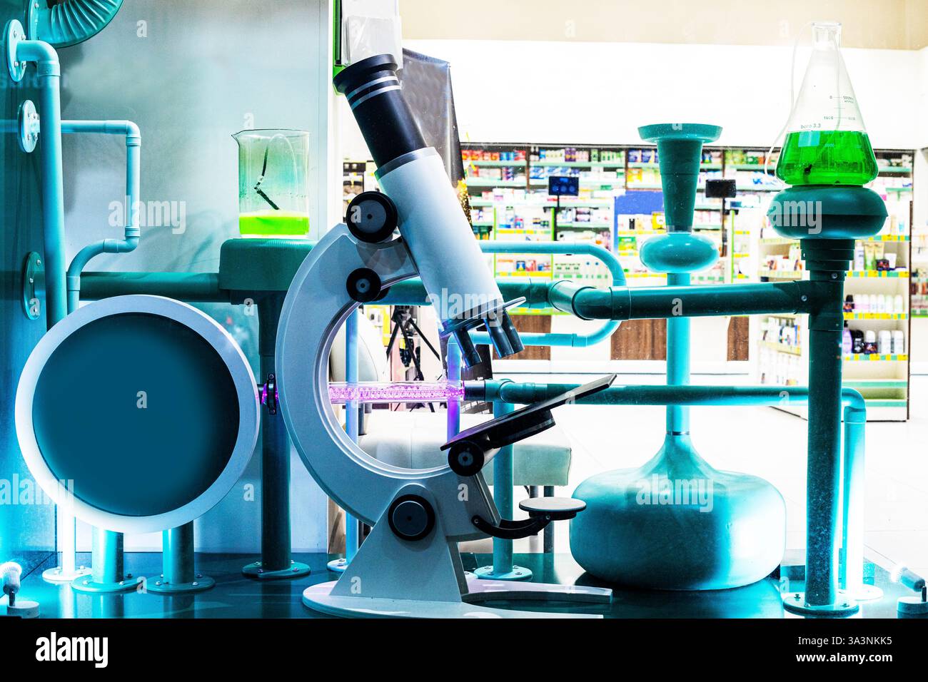 microscope with flasks and pharmaceuticals. Health care Stock Photo - Alamy