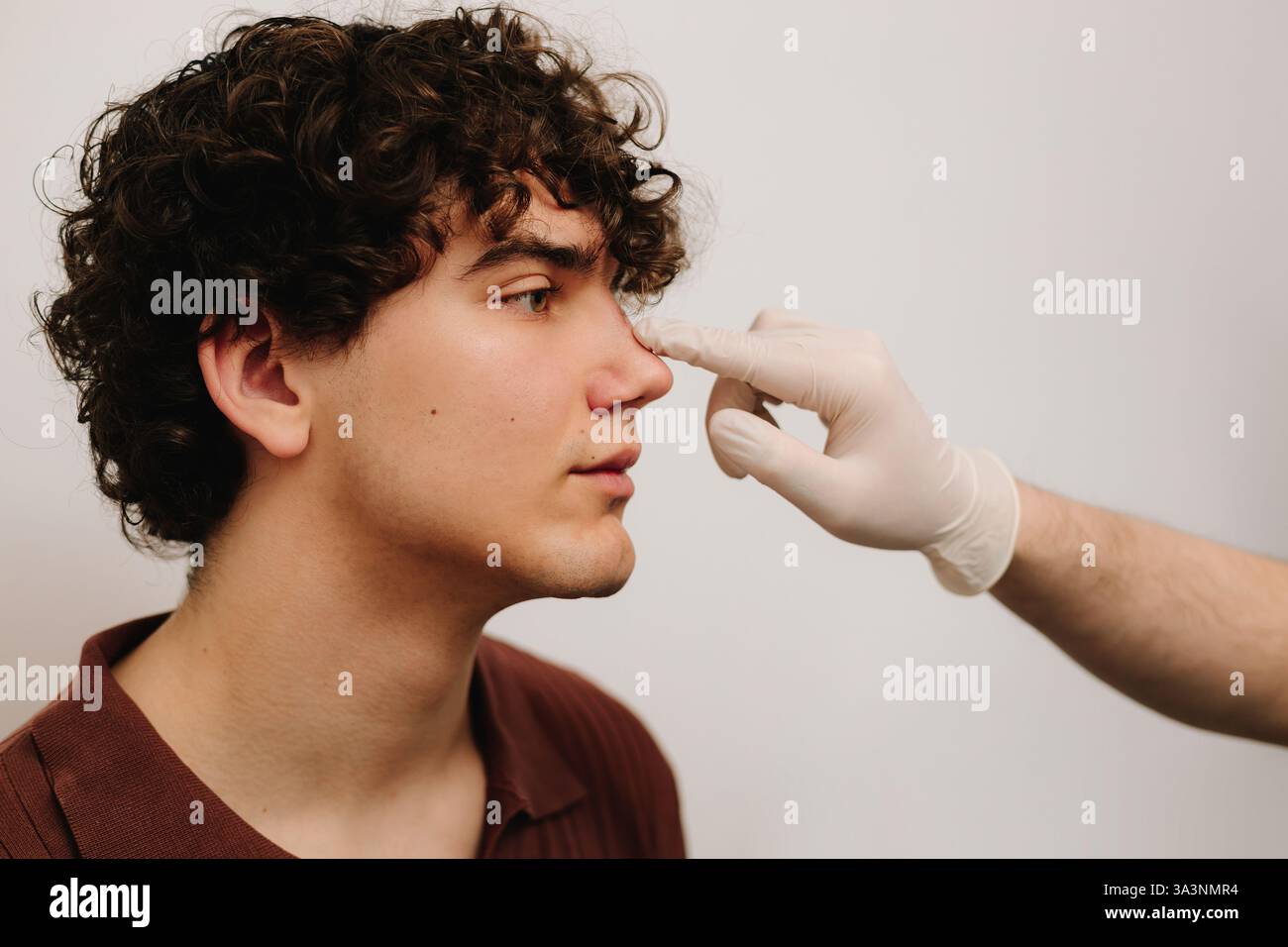 Rhinoplasty consultation for man before plastic surgery to correct the ...